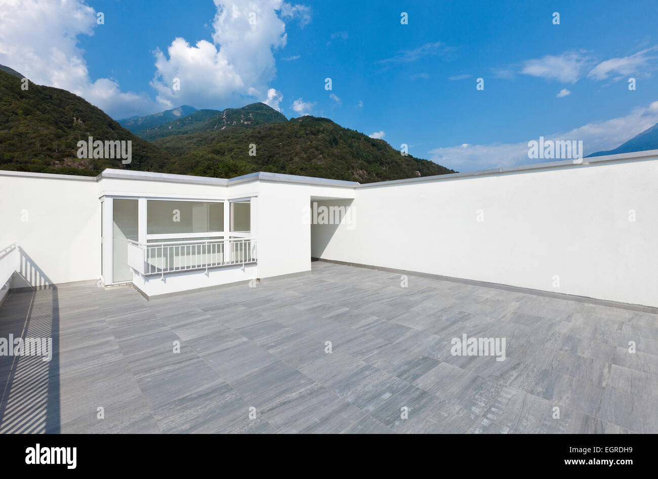 large terrace of a modern white house Stock Photo - Alamy