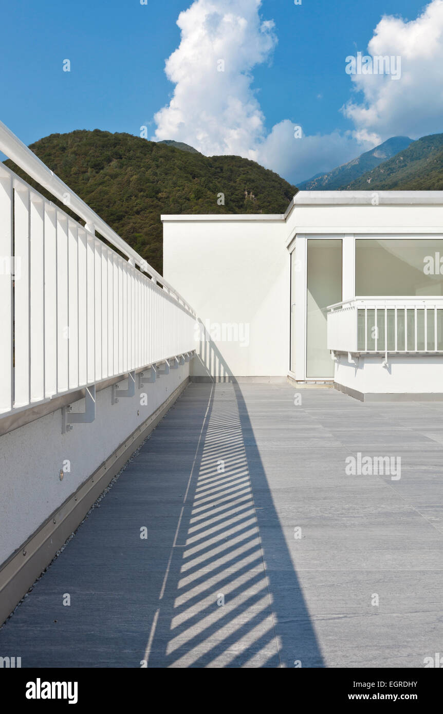 large terrace of a modern white house Stock Photo - Alamy