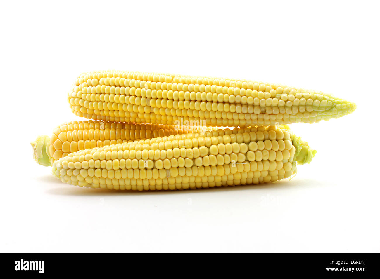 An ear of corn on a white background Stock Photo - Alamy