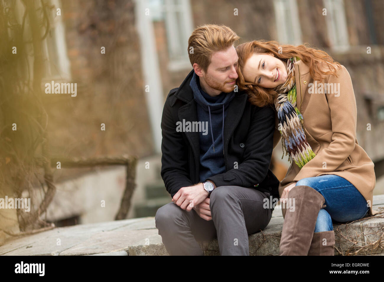 Young red hair couple at autumn park Stock Photo - Alamy