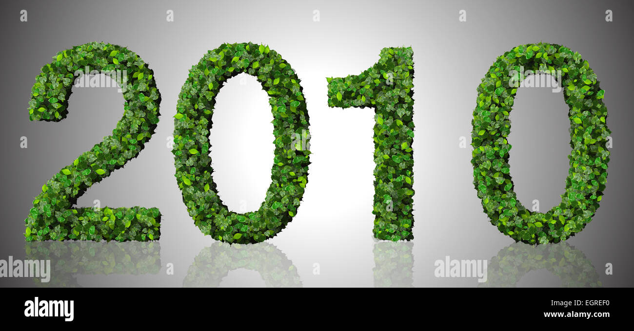 Year 2010, date made from green leaves isolated on white background ...