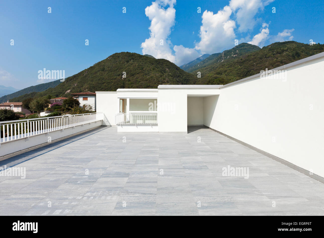 large terrace of a modern white house Stock Photo - Alamy