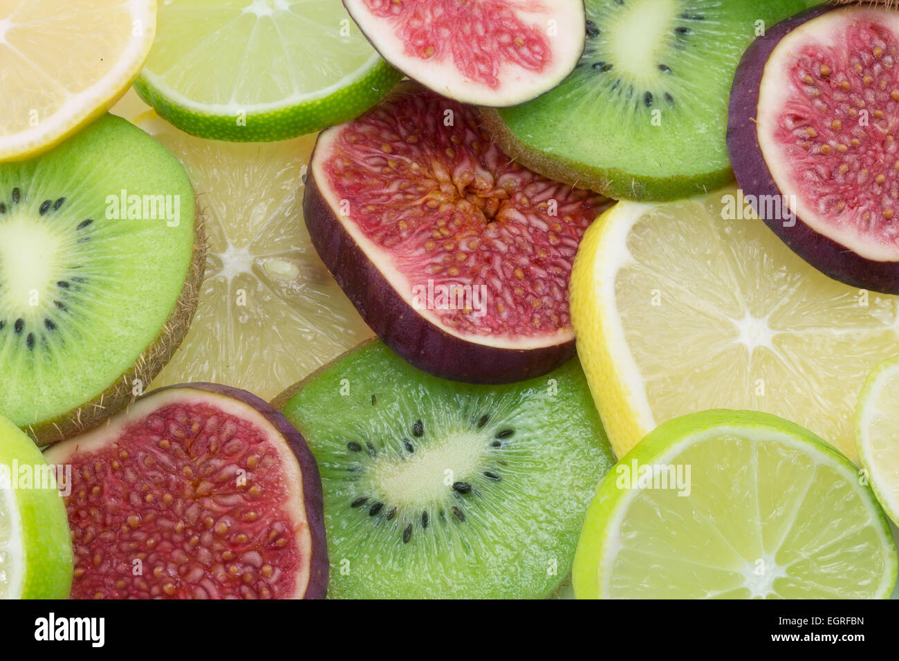 kiwi, lemon, fig on a white background Stock Photo - Alamy