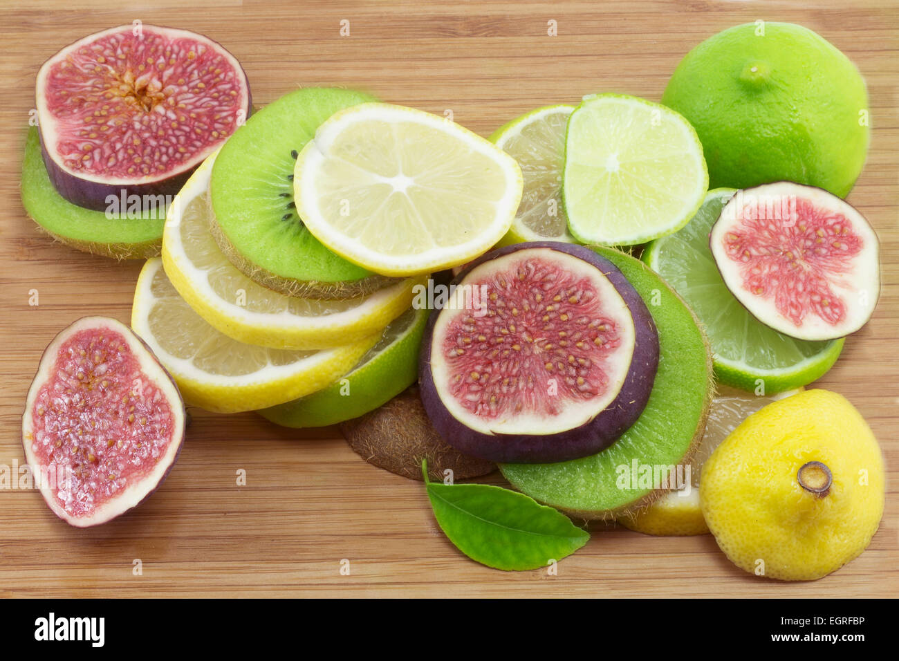kiwi, lemon, fig on a white background Stock Photo - Alamy