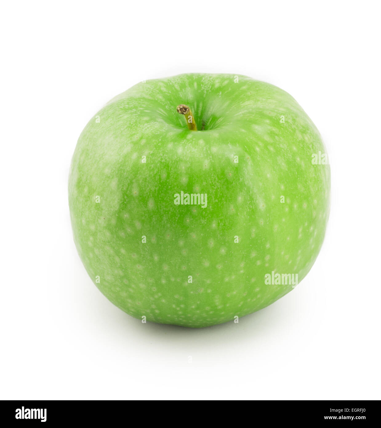 green apple on the white background Stock Photo - Alamy