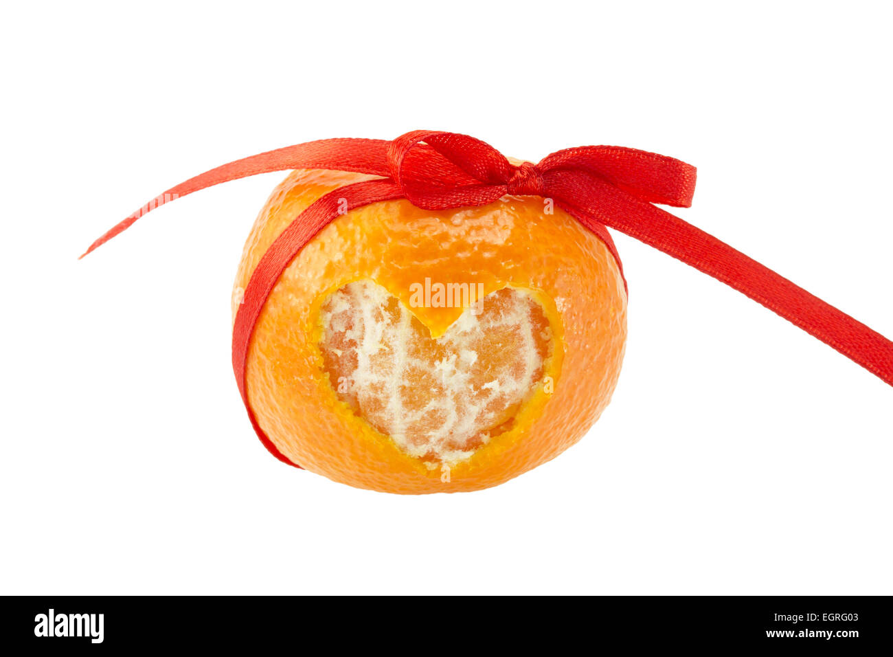 tangerine peel in the shape of a heart on a white background Stock ...