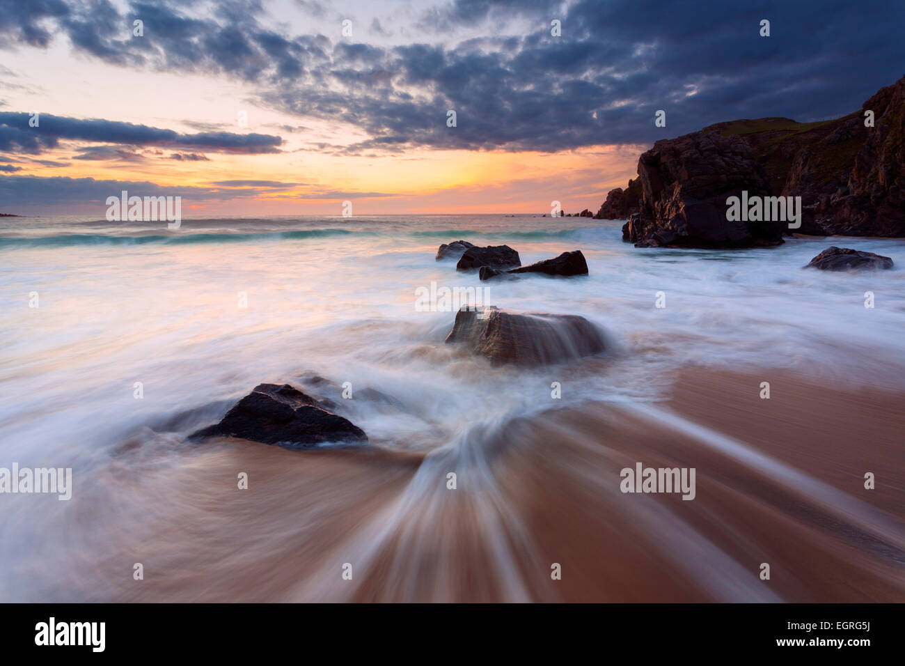 Sea waves hit rocks sandy hi-res stock photography and images - Alamy