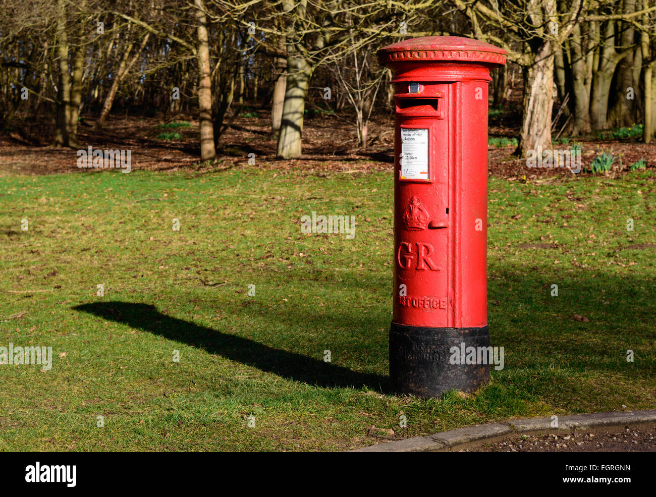 A red, British Royal Mail post box in the grounds of Newstead Abbey ...