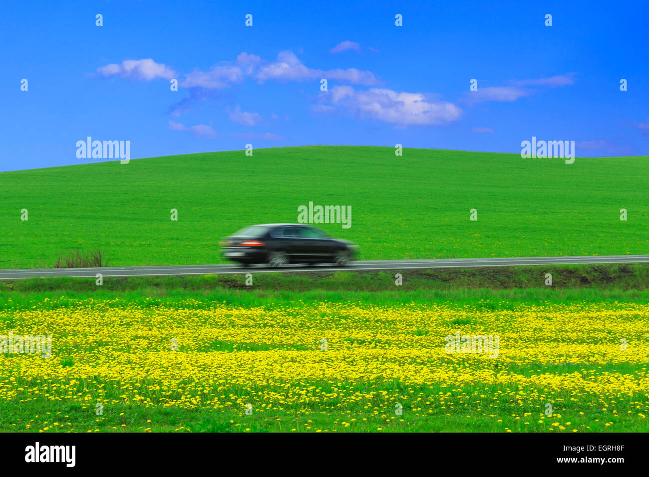 High speed road with cloud background Stock Photo - Alamy