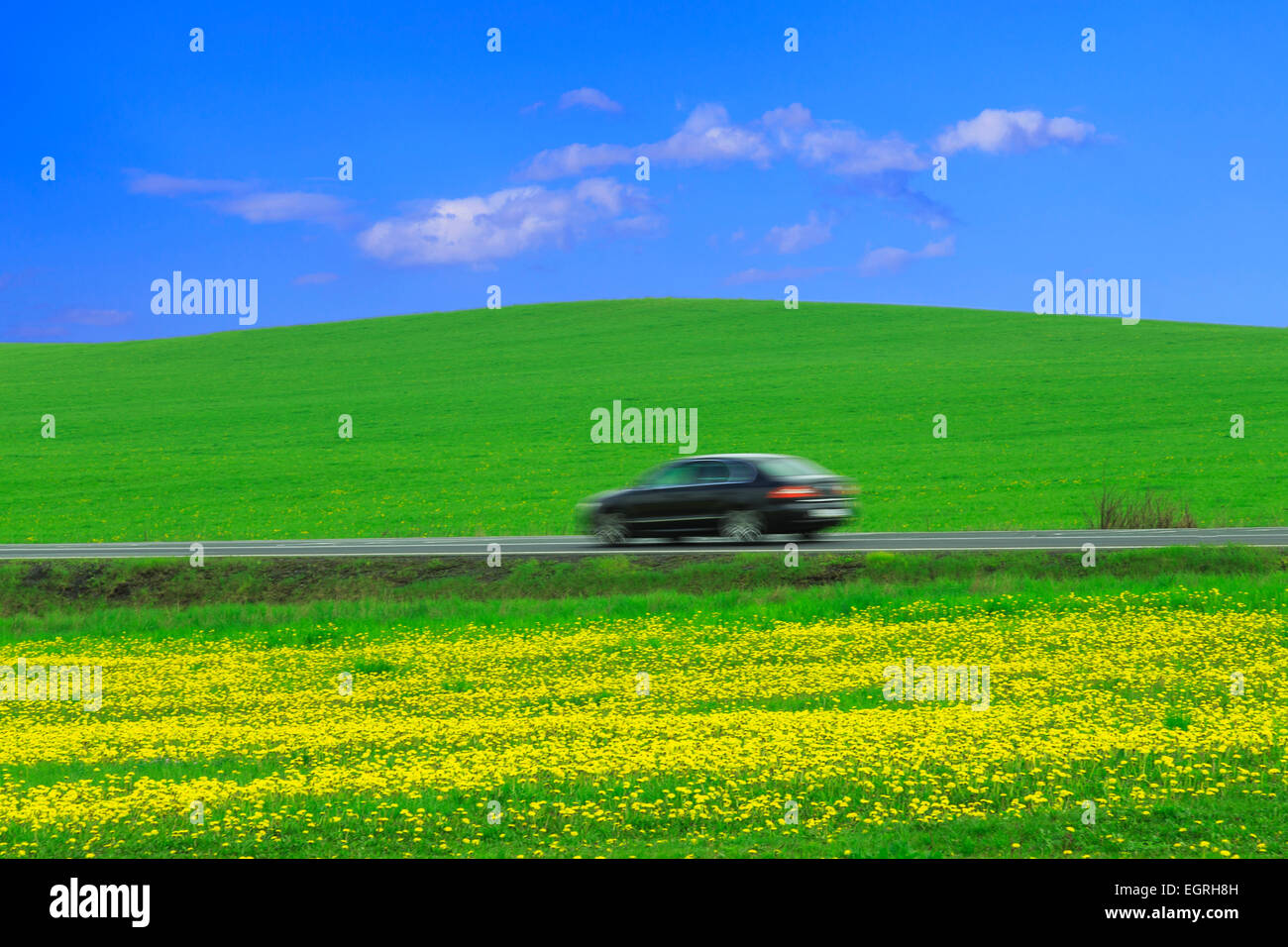 High speed road with cloud background Stock Photo - Alamy