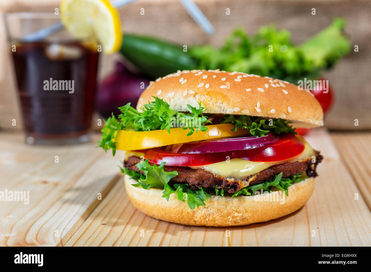hamburger and drink with slice of lemon Stock Photo - Alamy