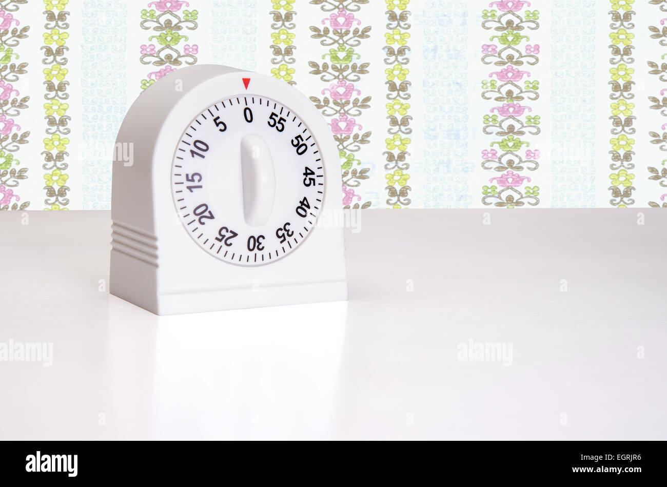Minute timer on kitchen counter top Stock Photo - Alamy