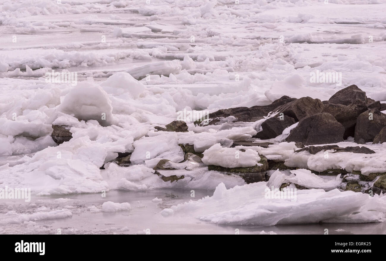 Frozen Slabs of the Chesapeake Bay make a counter point to Rocks Stock ...