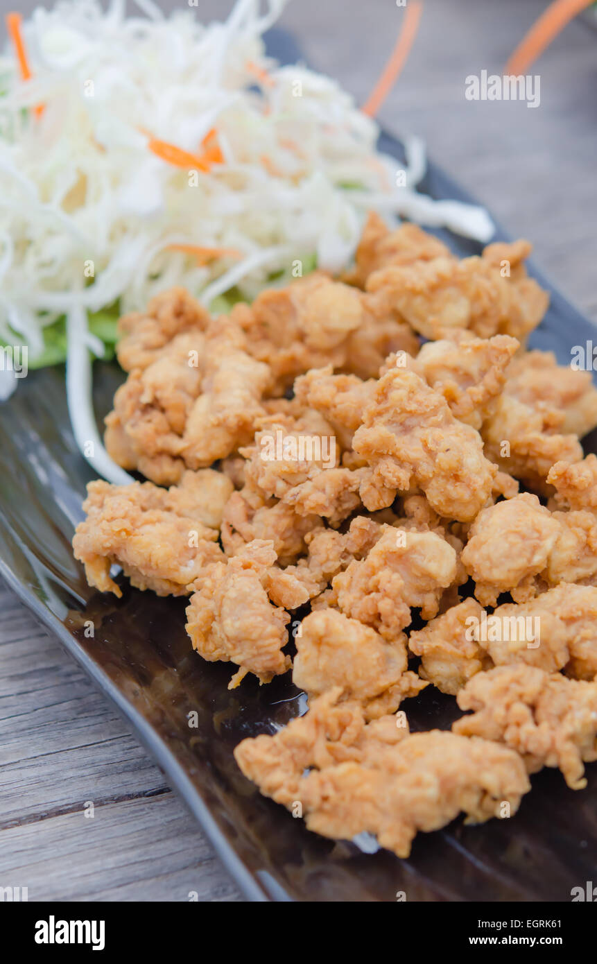 deep fried chicken tendons with fresh vegetable and chili sauce, asian ...