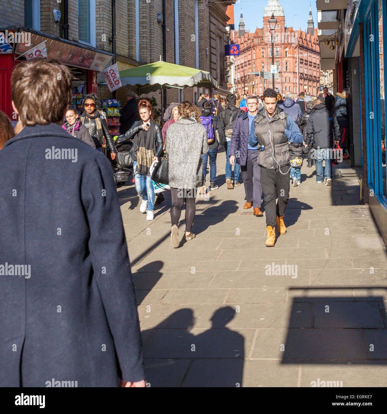 People walking on a city street. Exchange Walk, Nottingham, England, UK ...
