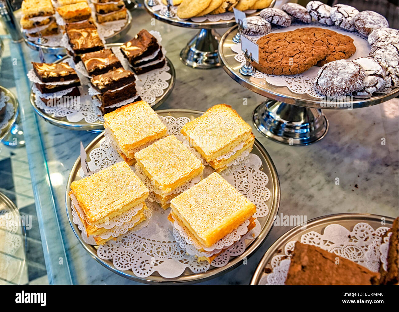 Assorted cookies, biscuits and cakes on the bakery storefront Stock ...