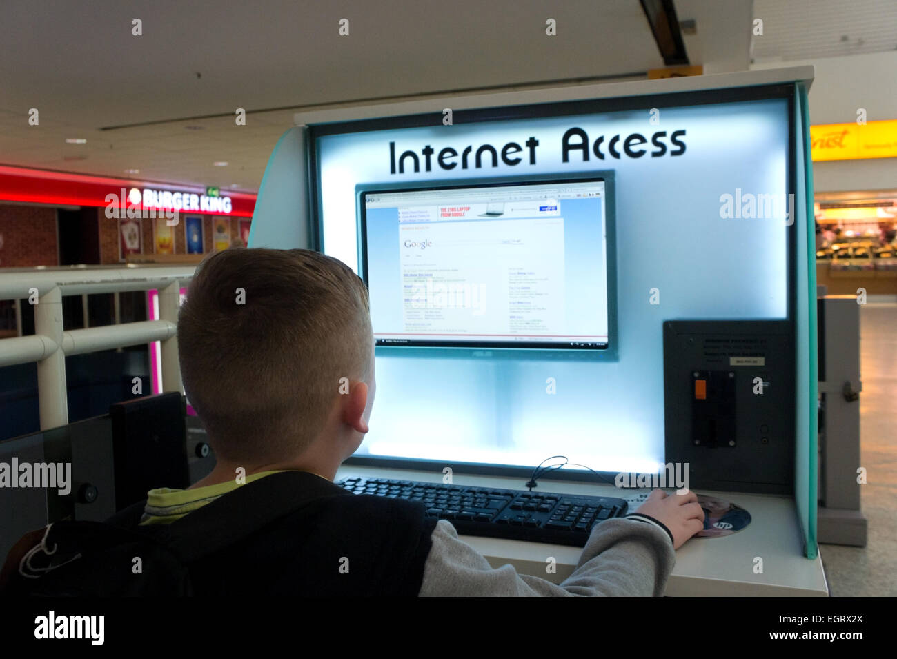 Boy using internet hi-res stock photography and images - Alamy