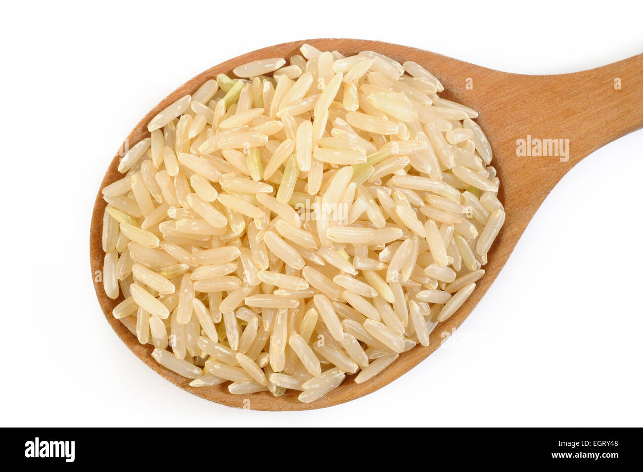 Brown rice in wooden spoon Stock Photo - Alamy