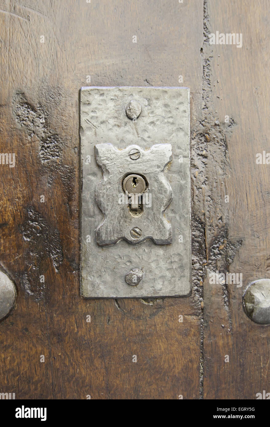 Old door lock, detail of an old lock decorated Stock Photo - Alamy