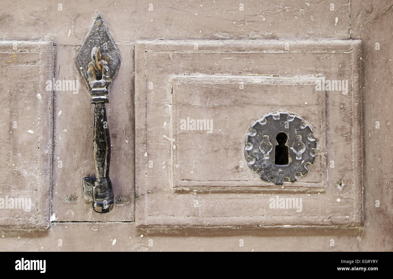 Old door lock, detail of an old lock decorated Stock Photo - Alamy