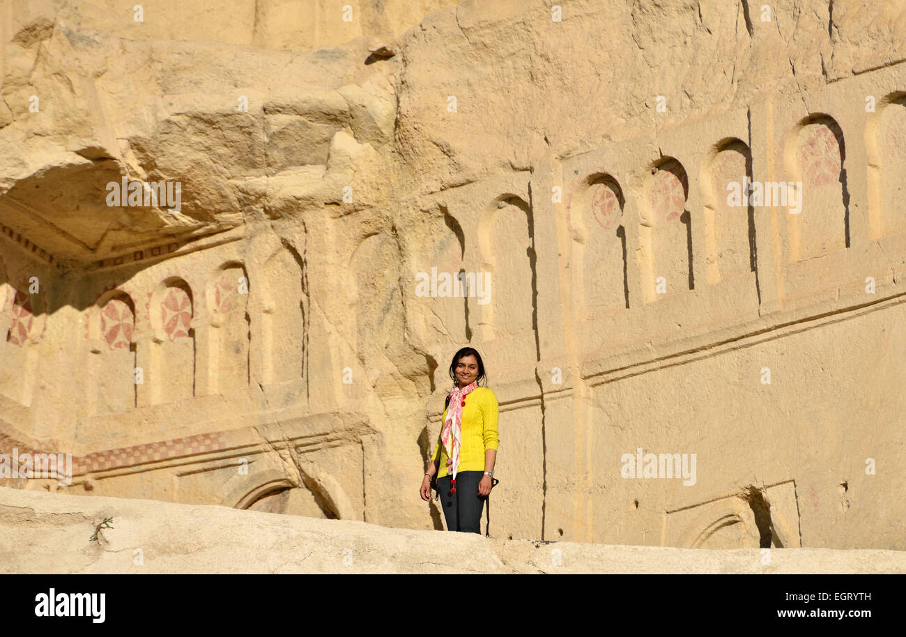 Tourists posing outside Karanlik (Dark) Church, Goreme Open Air Museum ...