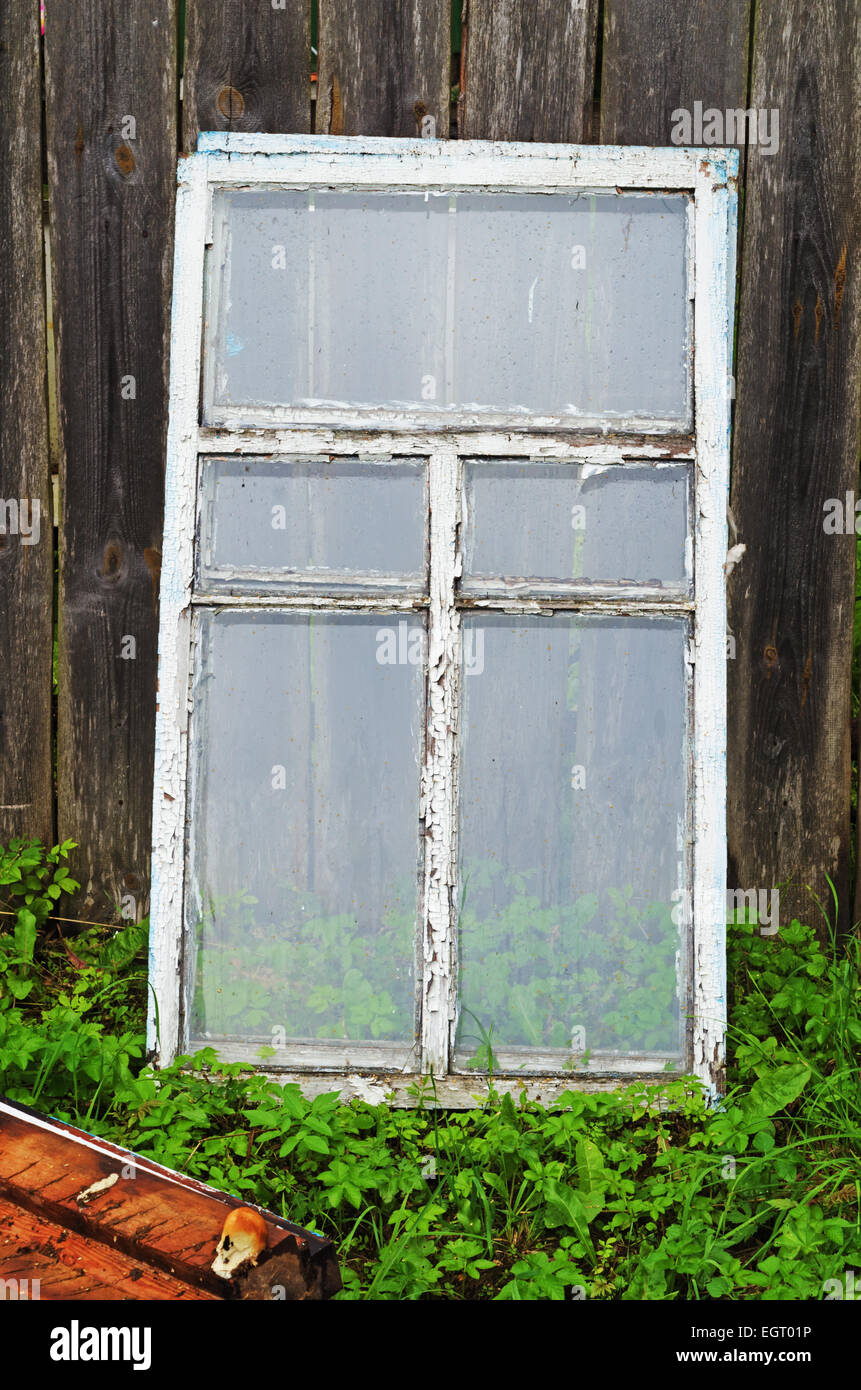Abandoned rural wooden house. The removed windows Stock Photo - Alamy