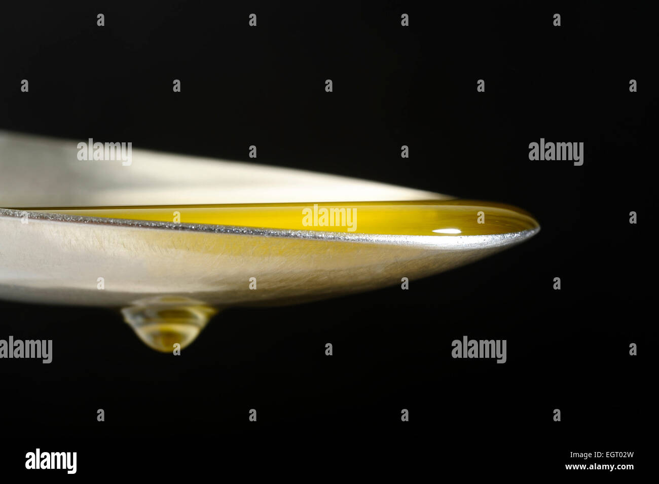 Oil in spoon hi-res stock photography and images - Alamy