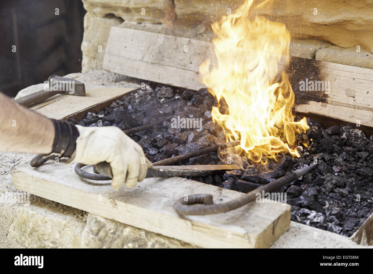 Flames in a forge, a forge detail for shaping metals, craftsmanship ...