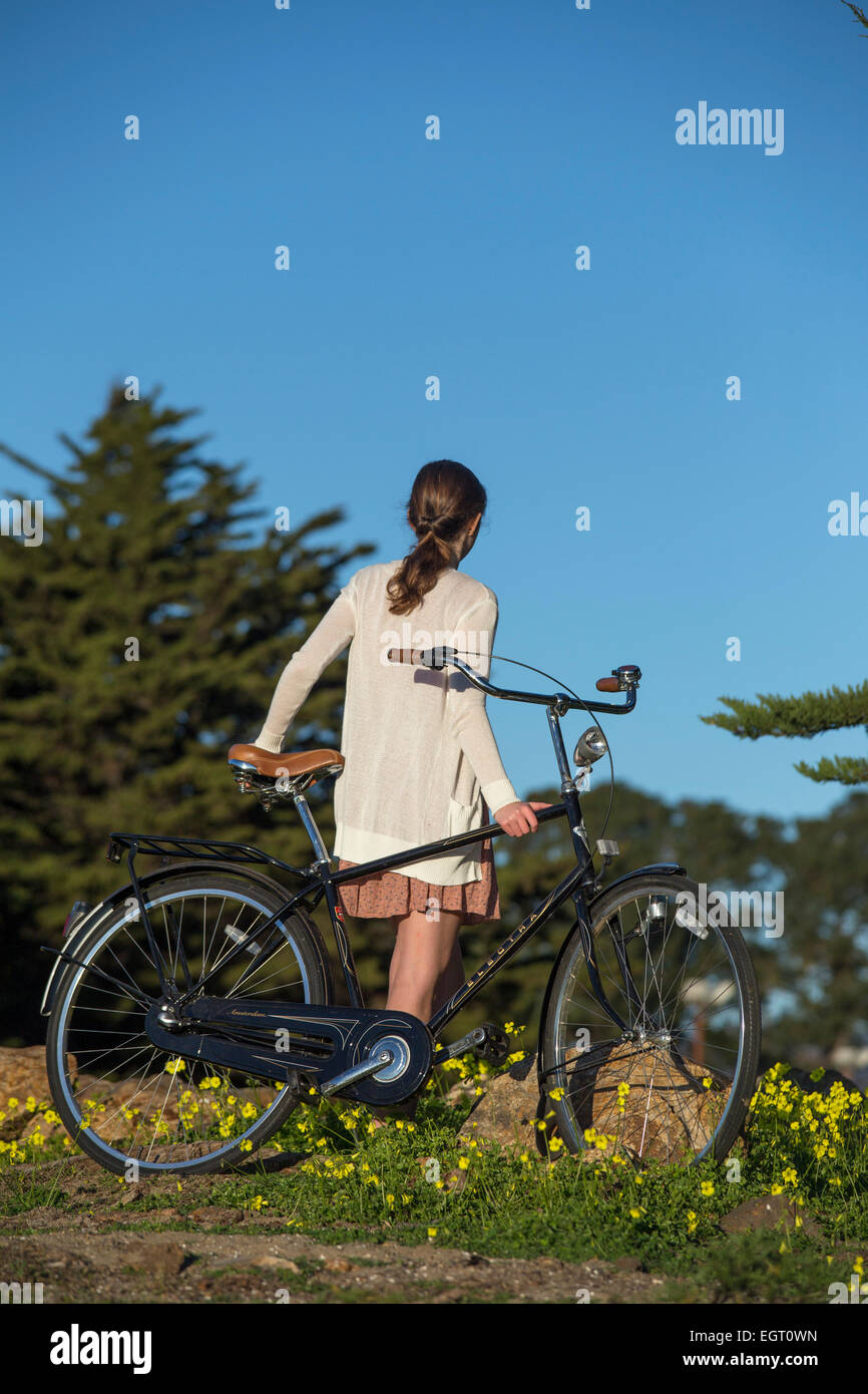 Girl with Bicycle Book Cover Concept Stock Photo - Alamy