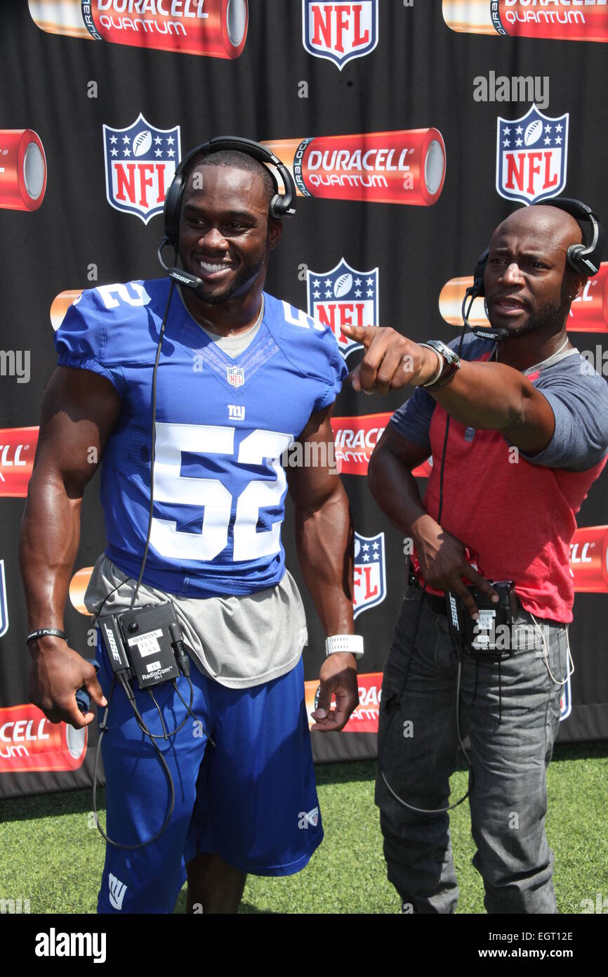 Taye Diggs and professional football player Jon Beason at the ...