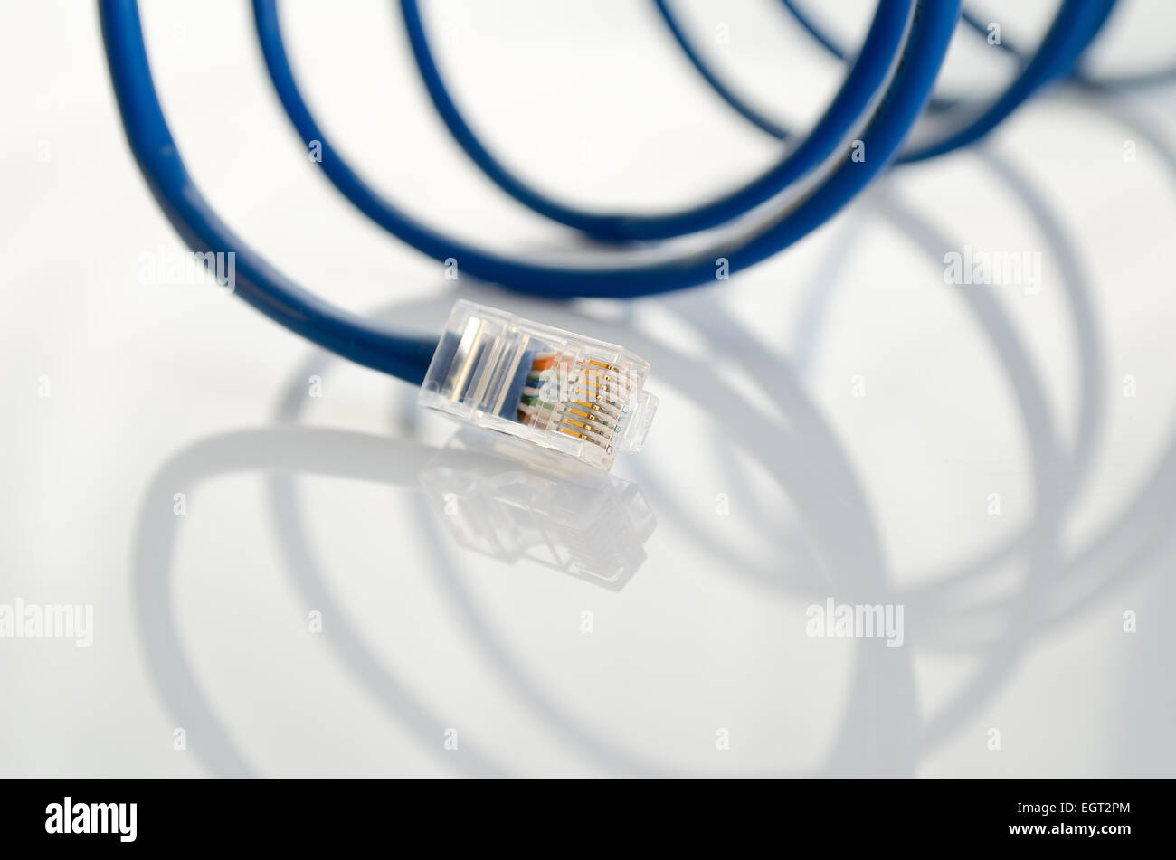 Rj45 blue network plug on white Stock Photo - Alamy