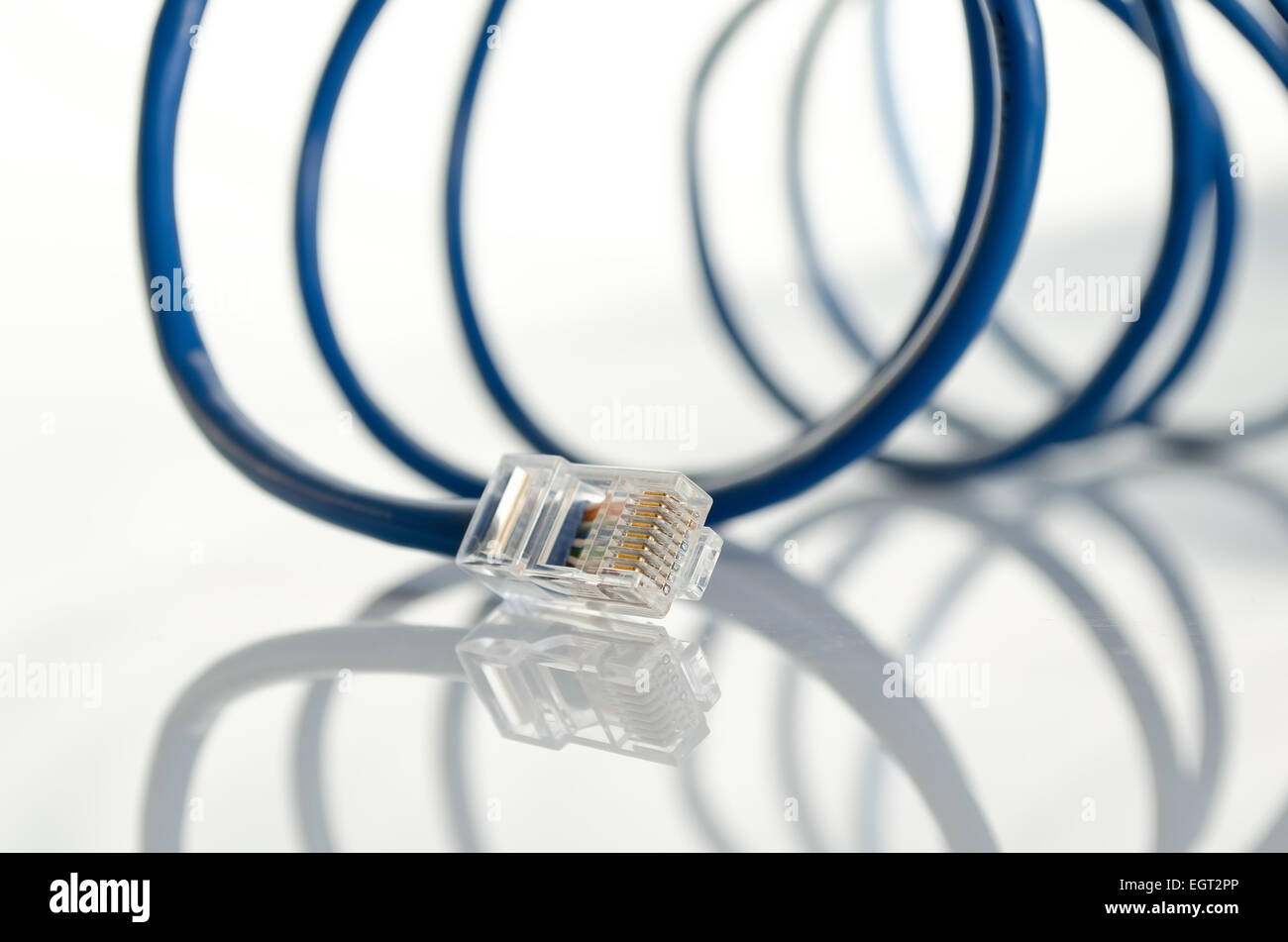 Rj45 blue network plug on white Stock Photo - Alamy