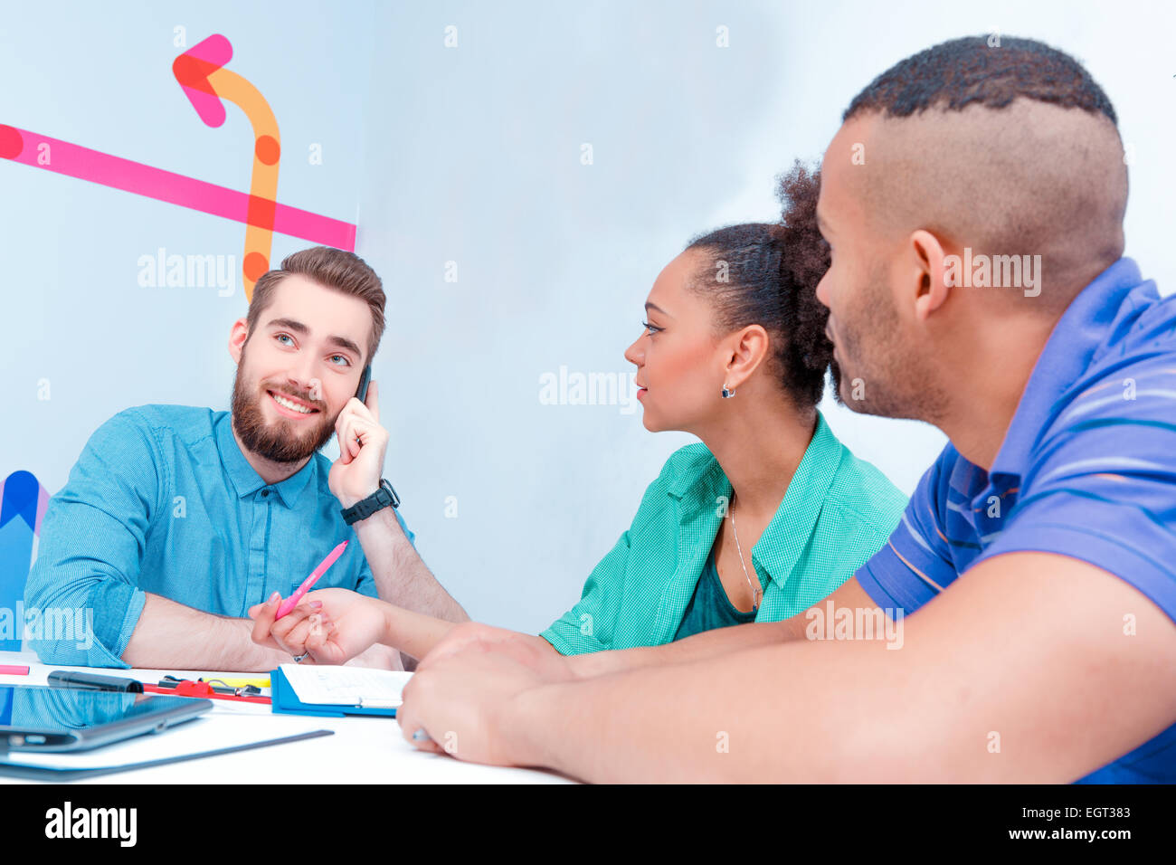 Young creative people at brainstorming Stock Photo - Alamy