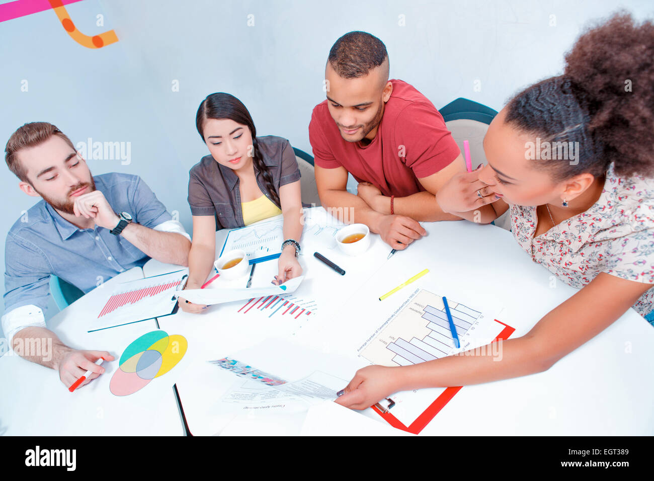 Young creative people at brainstorming Stock Photo - Alamy