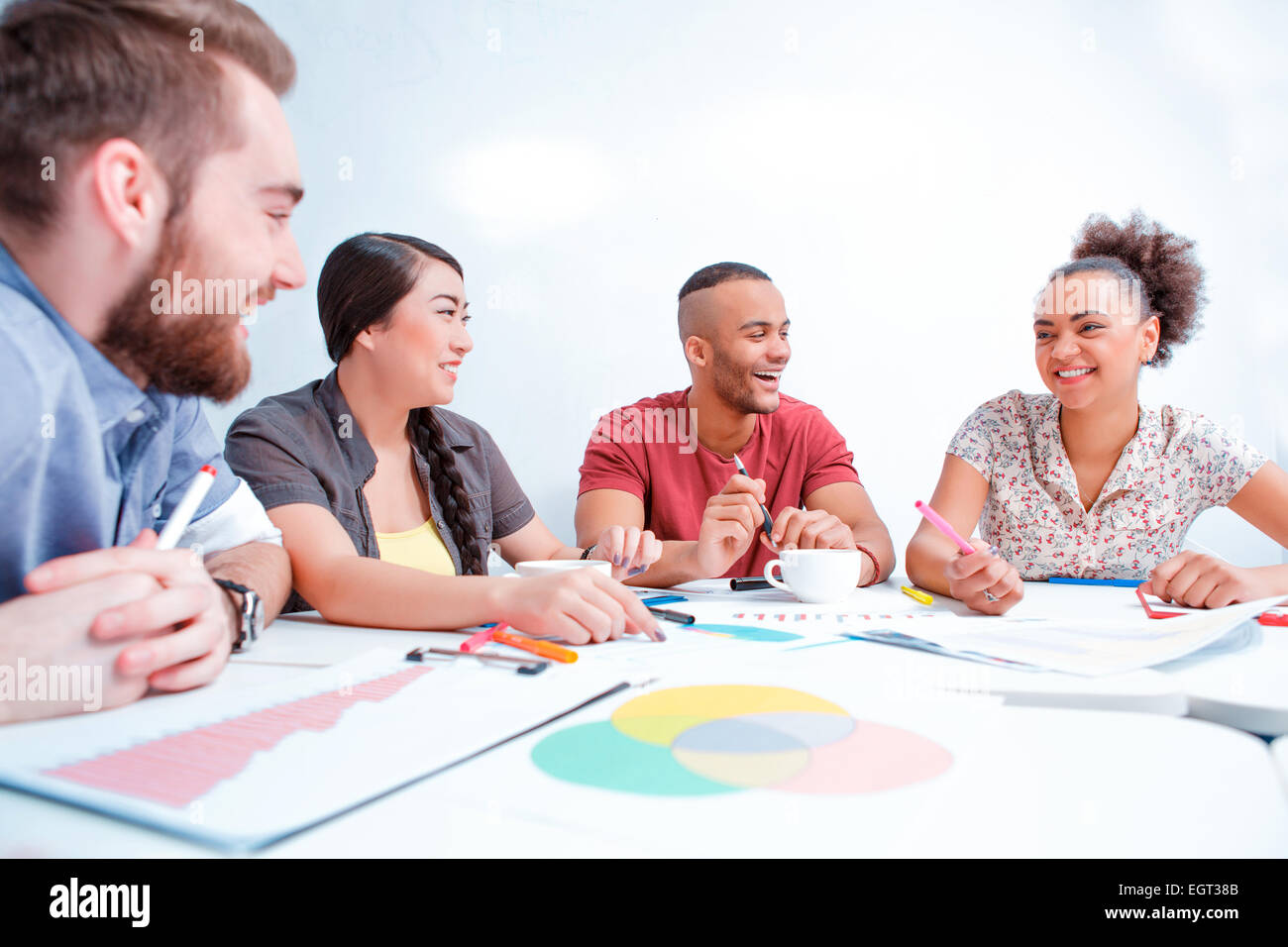 Young creative people at brainstorming Stock Photo - Alamy