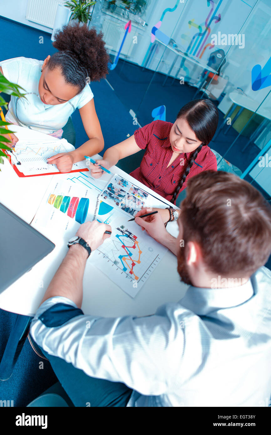Young creative people at brainstorming Stock Photo - Alamy