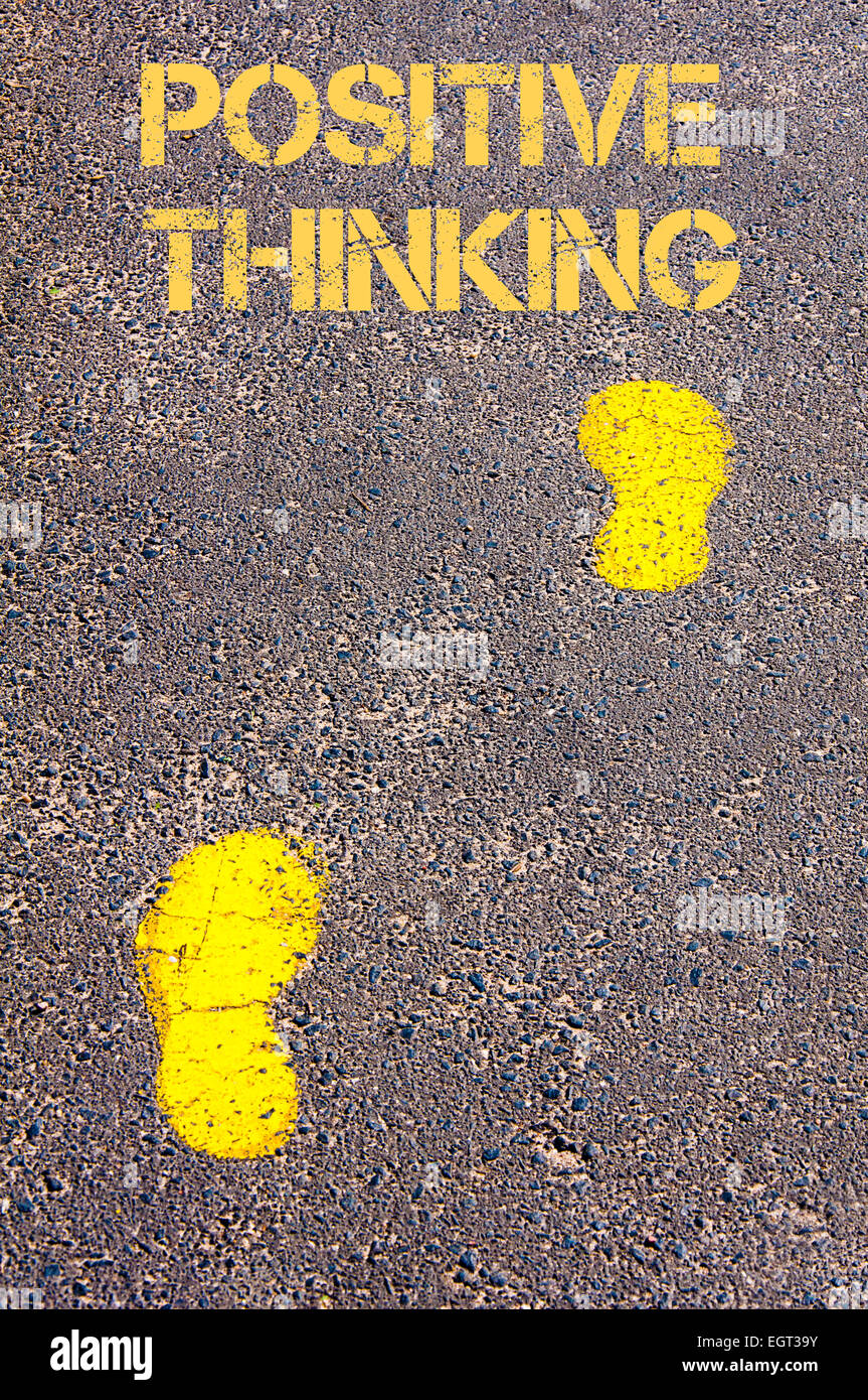 Yellow footsteps on sidewalk towards Positive Thinking message ...