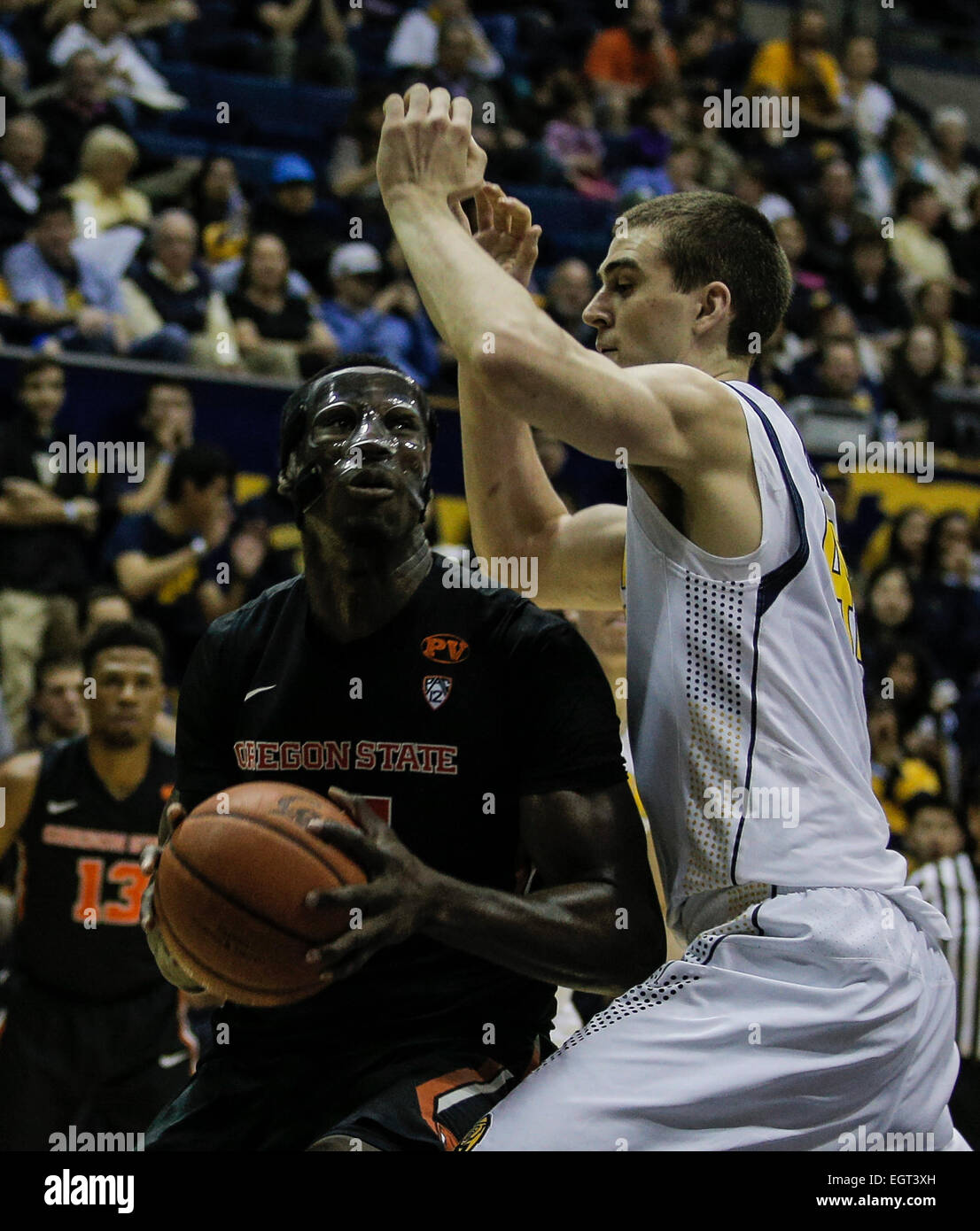 Berkeley USA CA. 01st Mar, 2015. OSU F # 14 Daniel Gomis and Cal's # 45 ...