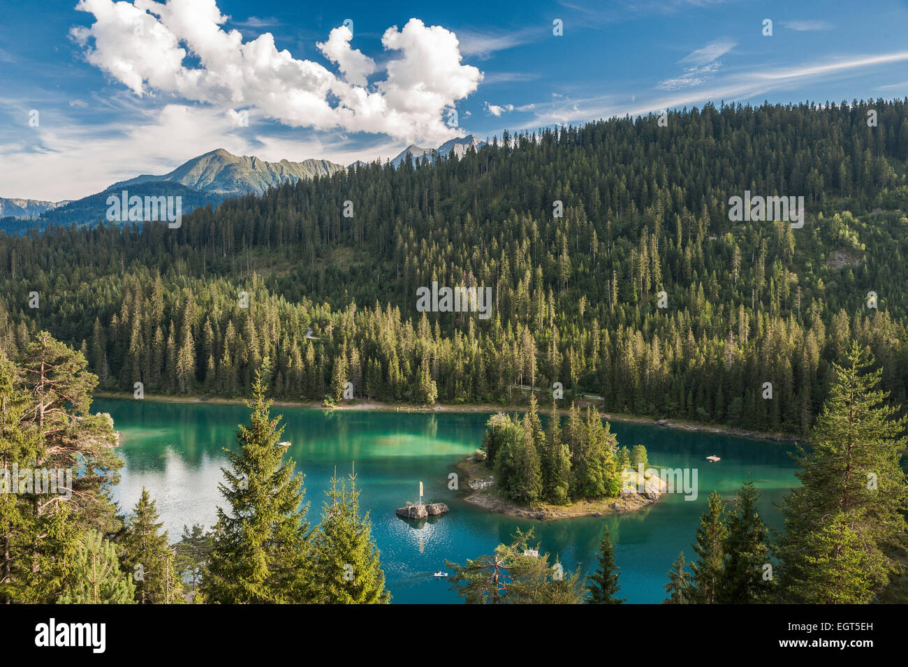 Lake Caumasee with island, bathing lake in the forest Flims, Flims ...