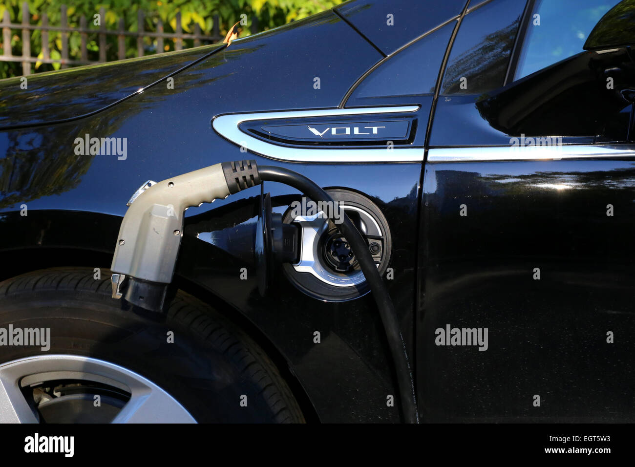 Chevy Volt charging plug Stock Photo - Alamy