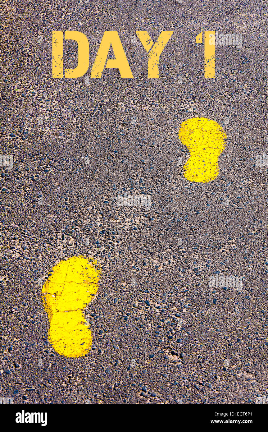 Yellow footsteps on sidewalk towards Day 1 message.Conceptual image ...