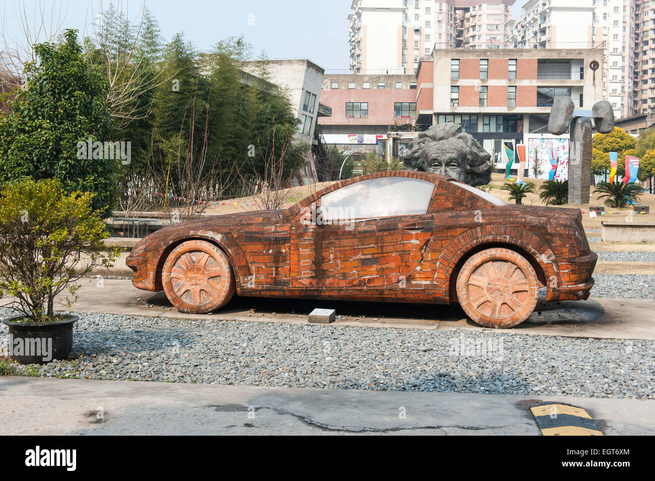 Shanghai, China. 1st March, 2015. A Benz car made of red bricks parks ...
