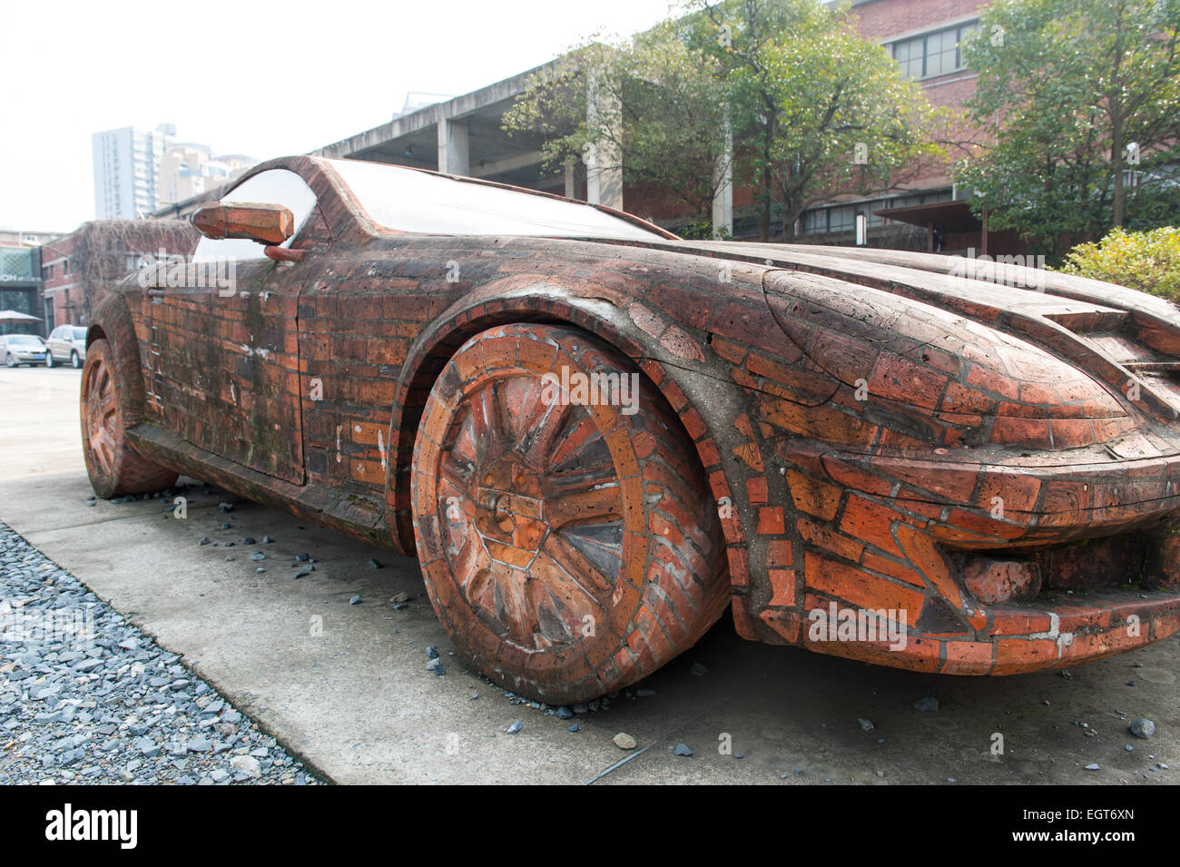 Shanghai, China. 1st March, 2015. A Benz car made of red bricks parks ...