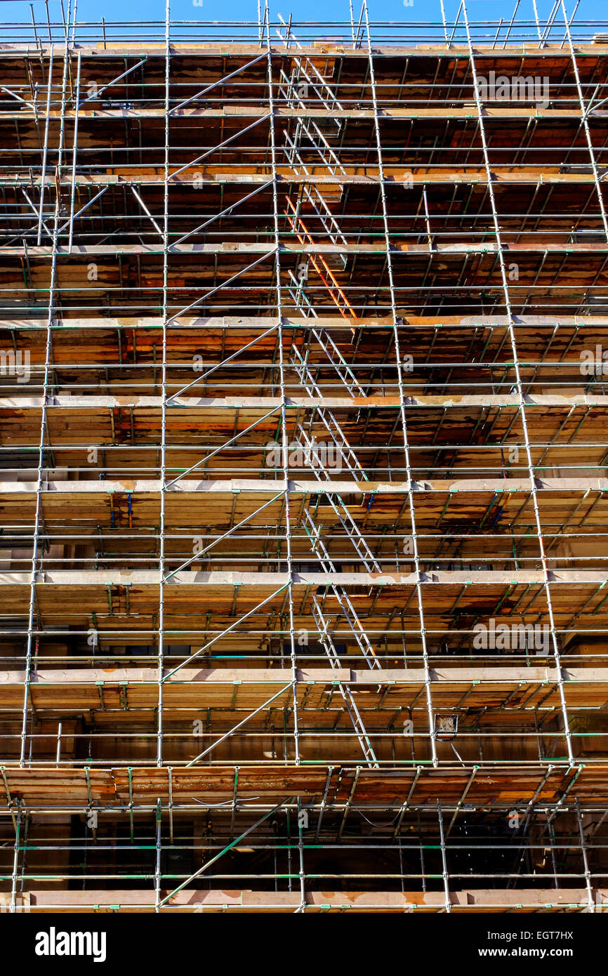 Scaffolding erected on a multi storey building under construction ...