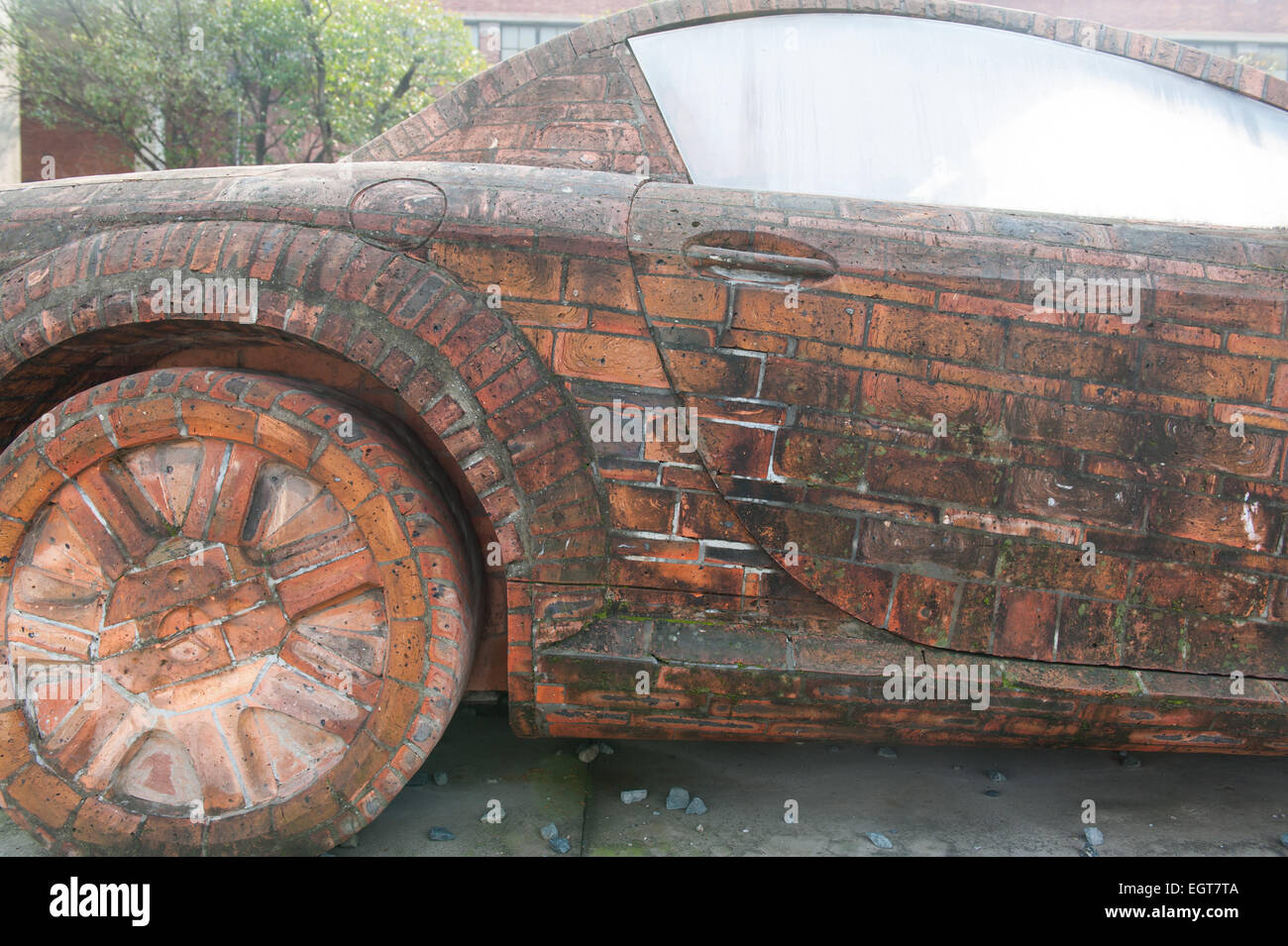 Shanghai, China. 1st March, 2015. A Benz car made of red bricks parks ...