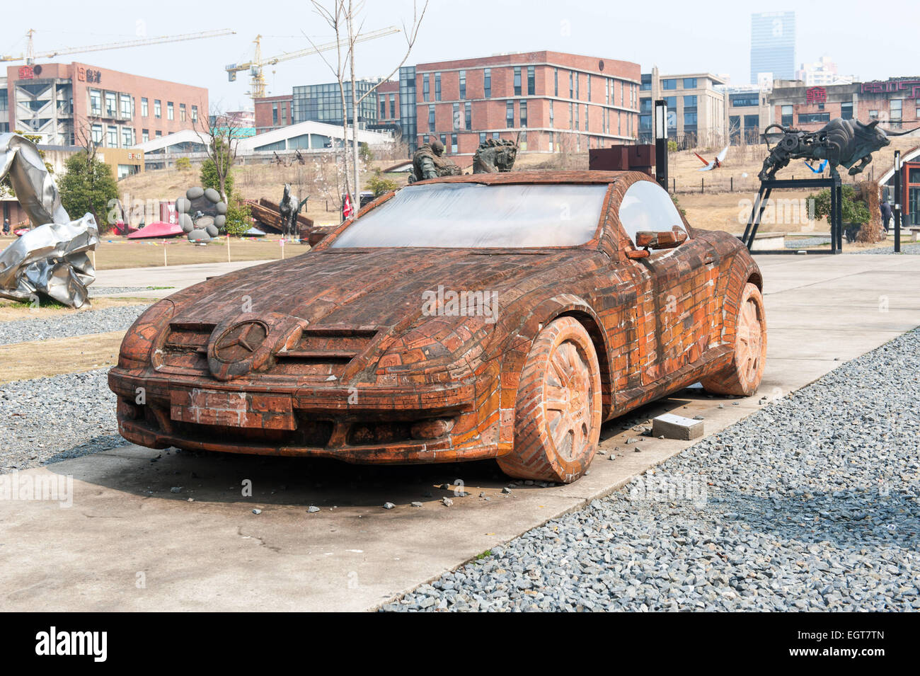 Shanghai, China. 1st March, 2015. A Benz car made of red bricks parks ...