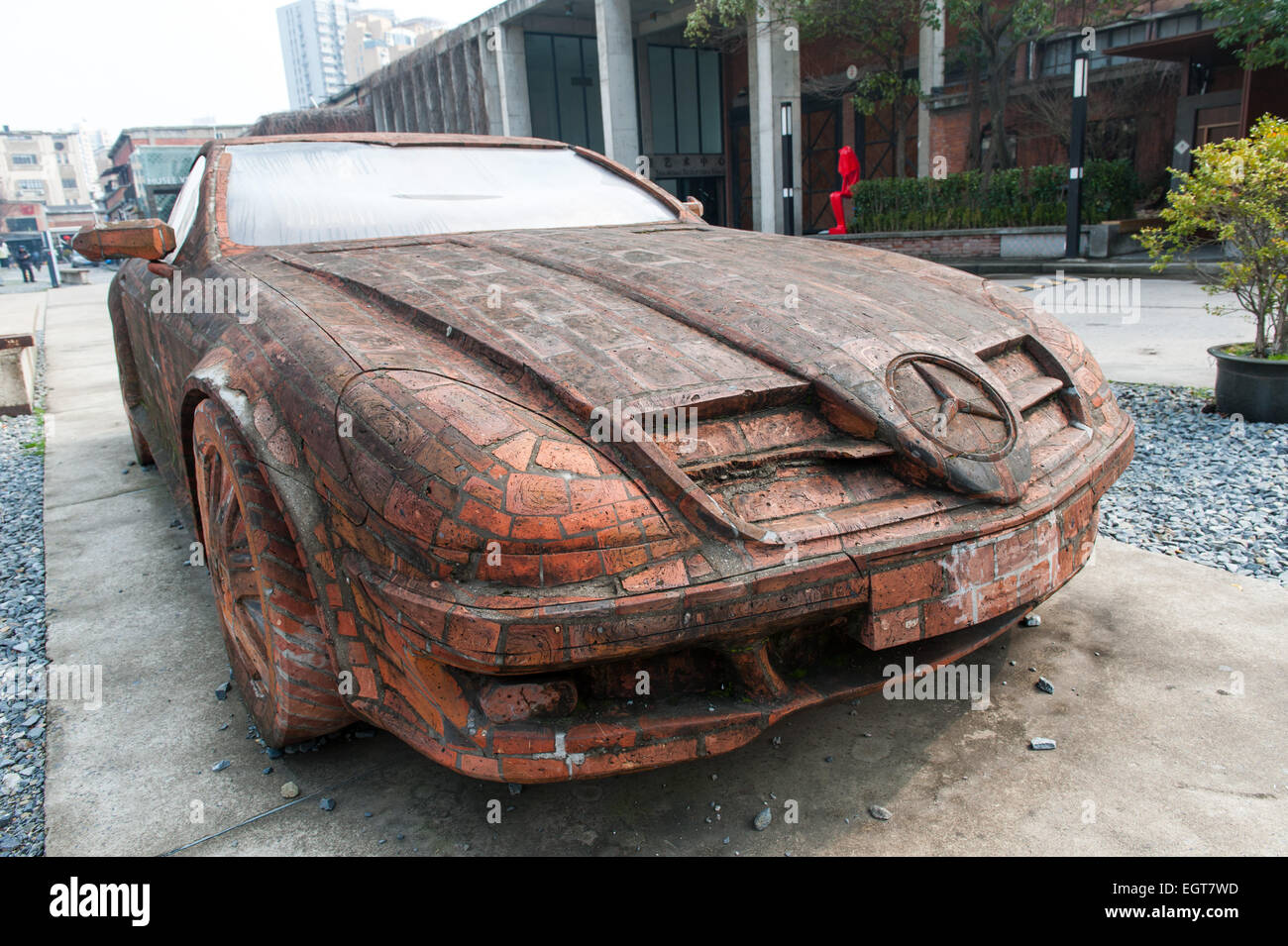 Shanghai, China. 1st March, 2015. A Benz car made of red bricks parks ...