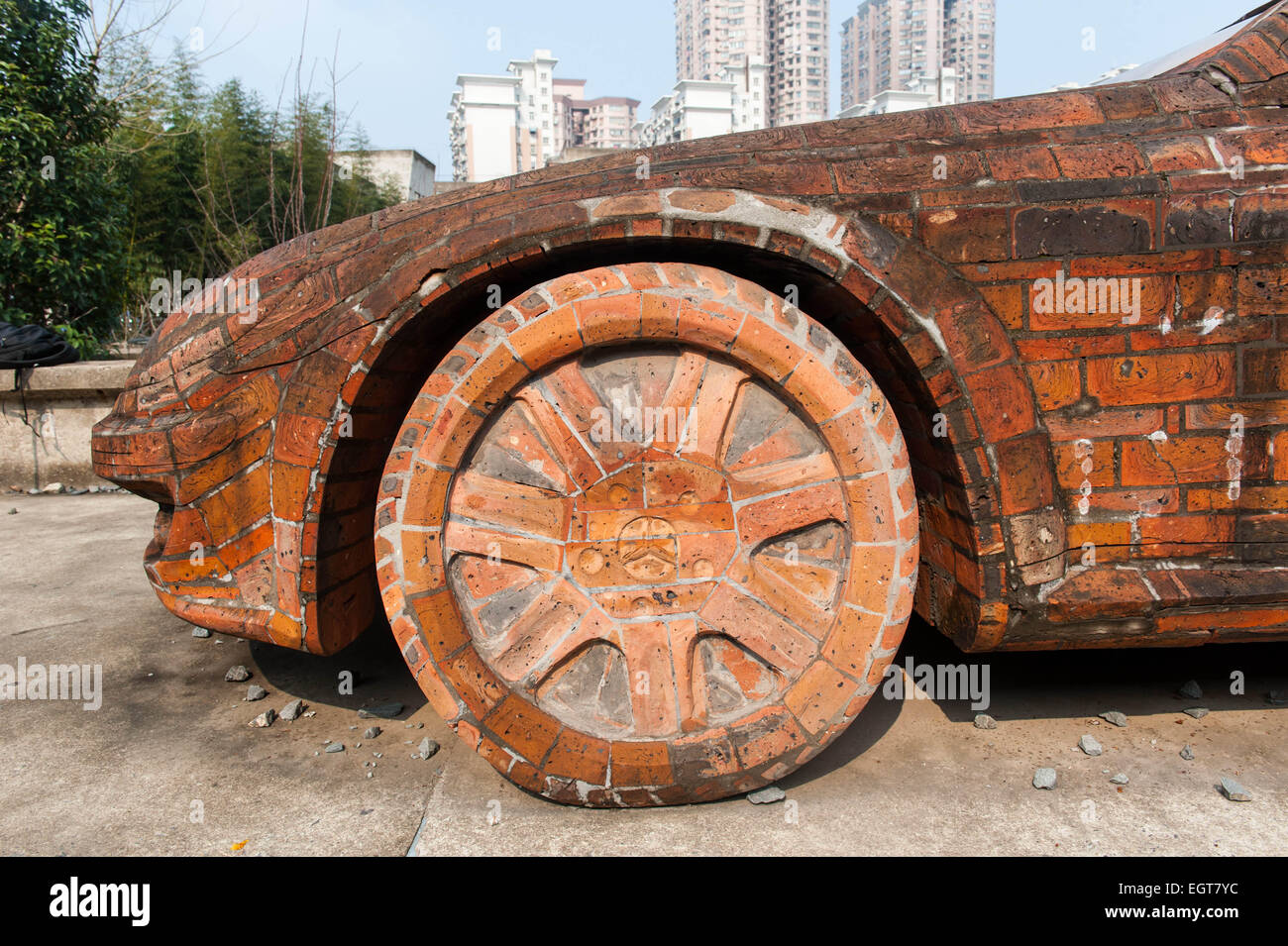 Shanghai, China. 1st March, 2015. A Benz car made of red bricks parks ...