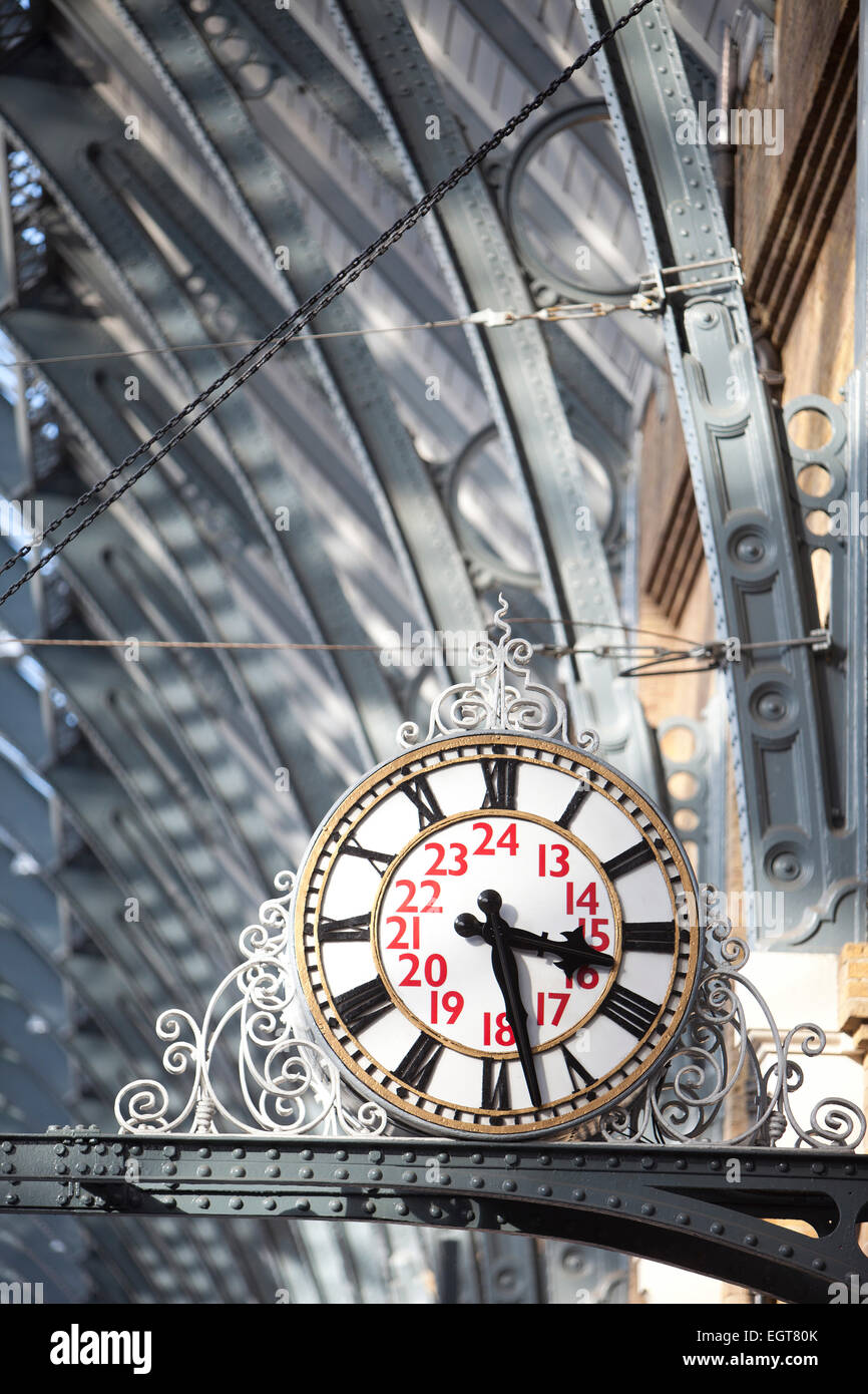 Clock with sunlight at King's Cross Station, London, England, UK Stock ...