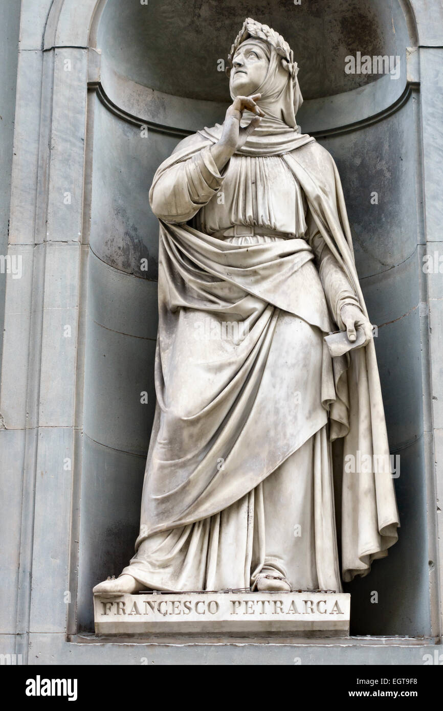 A 19c statue of the 14c poet and humanist scholar Petrarch outside the ...